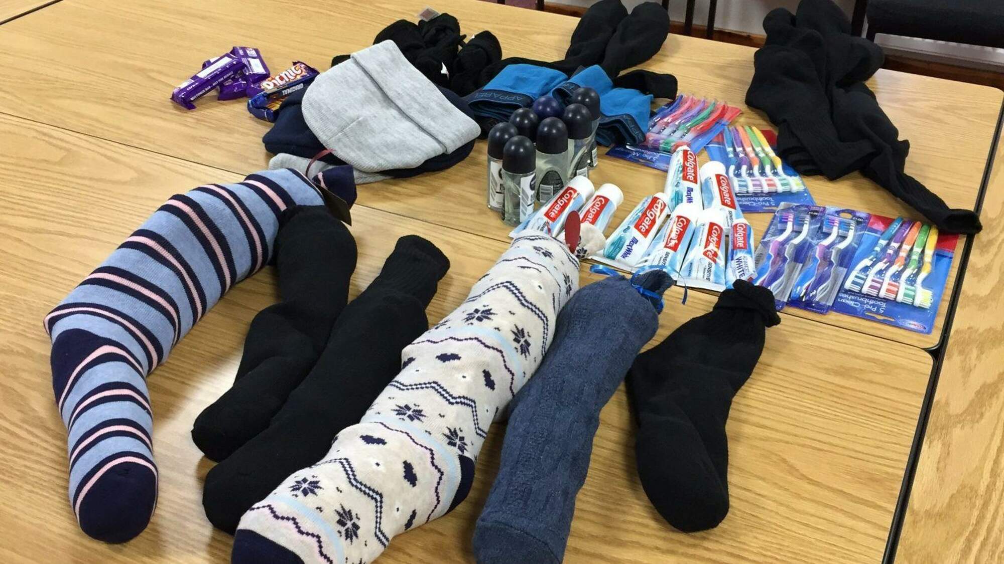 Filling socks for the homeless! - Good Shepherd Centre